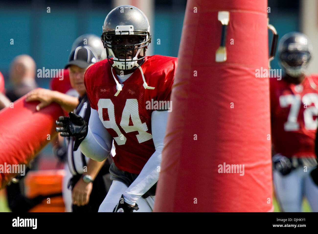 Tampa Buccaneer DE Kyle Moore (#94) runs through drills during training ...