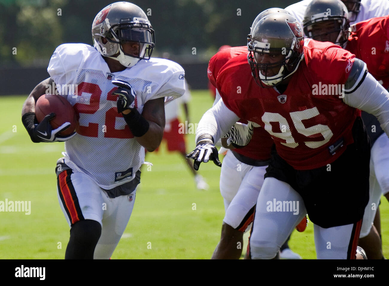 Tampa Buccaneer RB Clifton Smith (#22) running through drills during ...