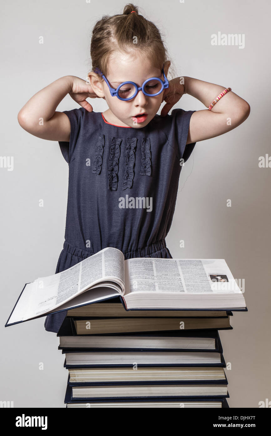 Reading encyclopedia hi-res stock photography and images - Alamy