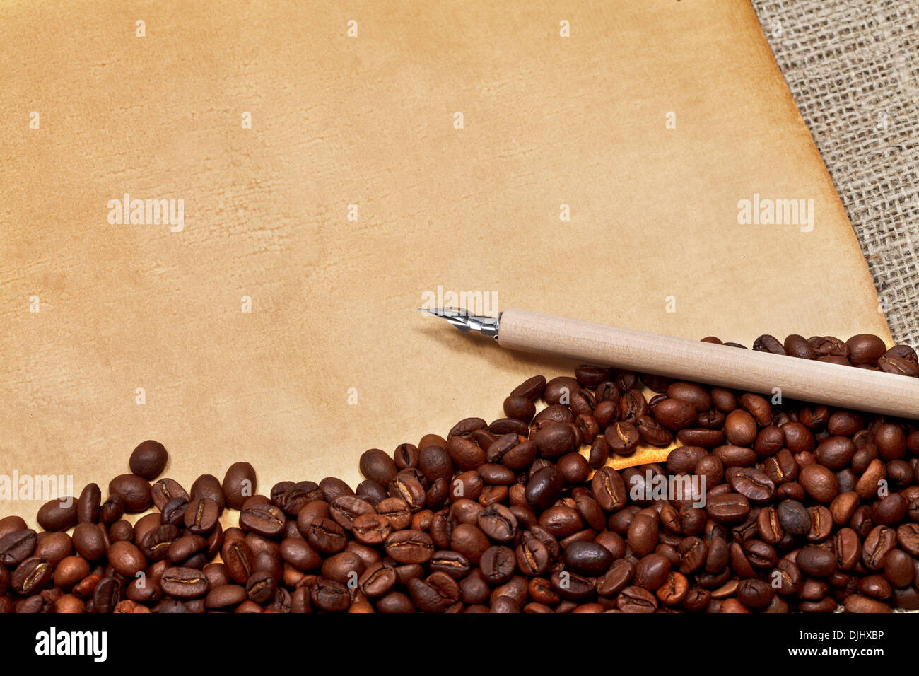 Old paper texture parchment with pen and coffee beans Stock Photo - Alamy