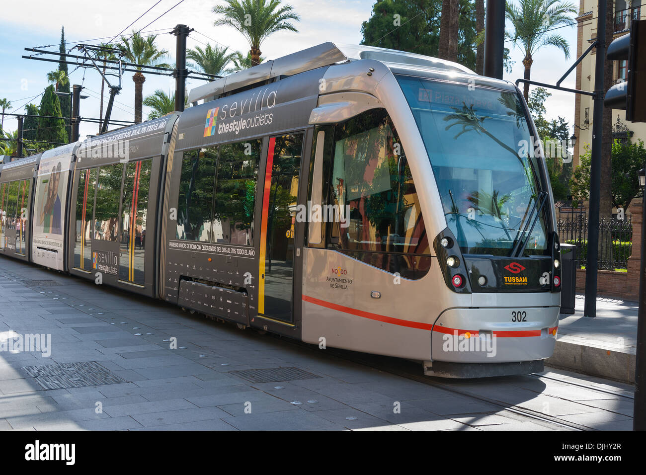 Tram train in Seville Spain Stock Photo - Alamy