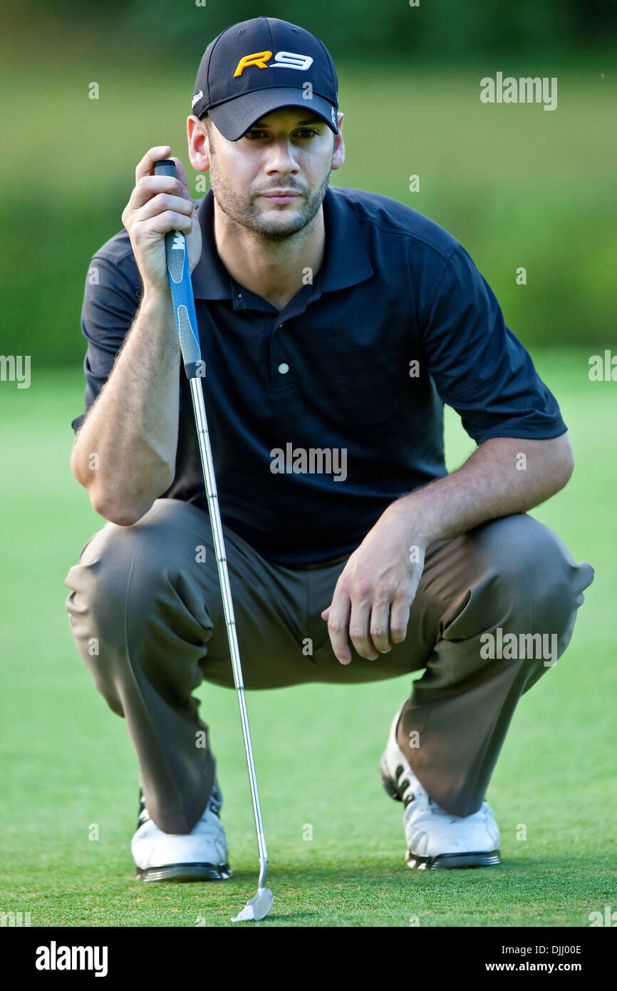 Brad Mates, lead singer of Emerson Drive, plays a game of golf the day ...