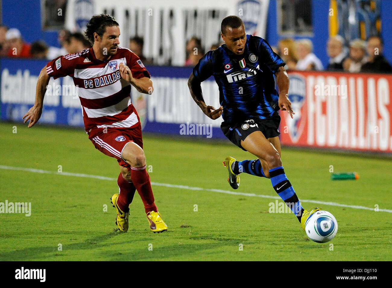Jonathan Biabiany #50 of Inter Milan drives the ball past Heath Pearce ...