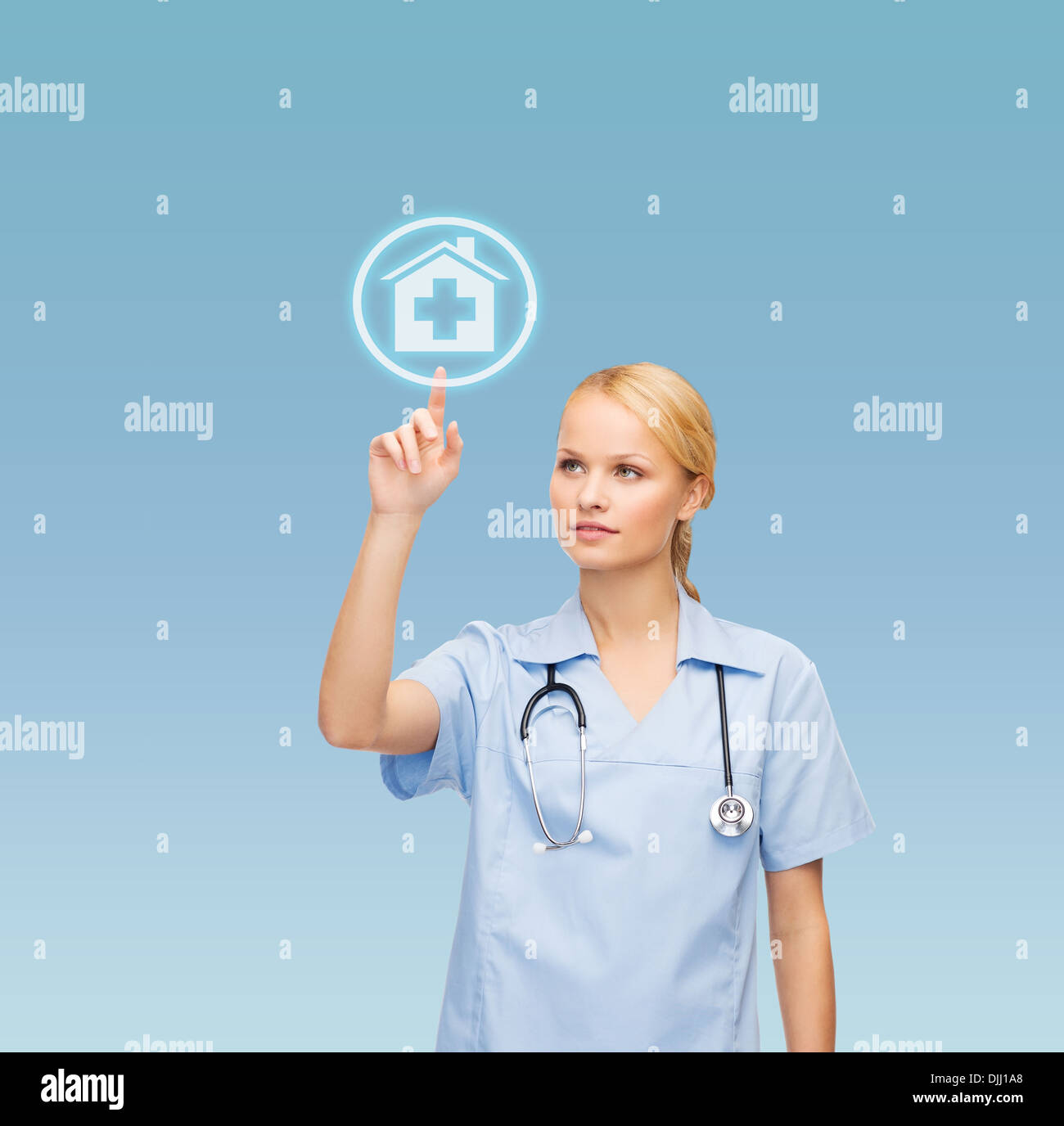 smiling doctor or nurse pointing to hospital icon Stock Photo - Alamy