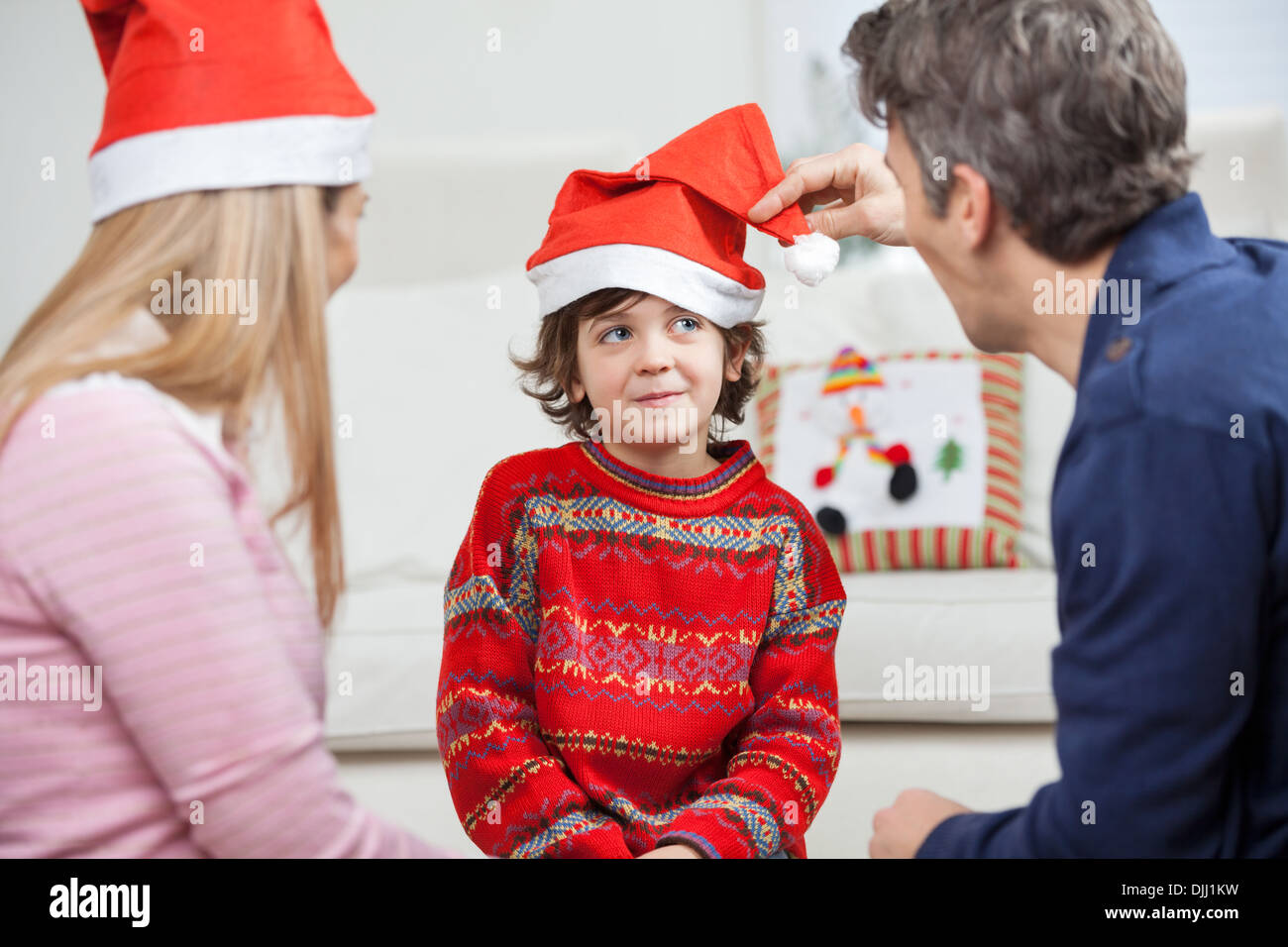Boy girl wearing santa hi-res stock photography and images - Alamy