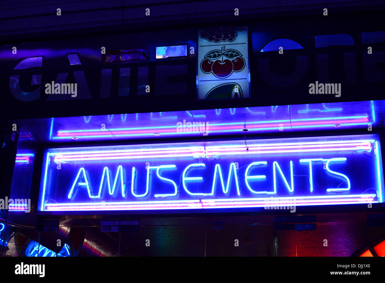 Blue Neon Amusements Sign Stock Photo - Alamy