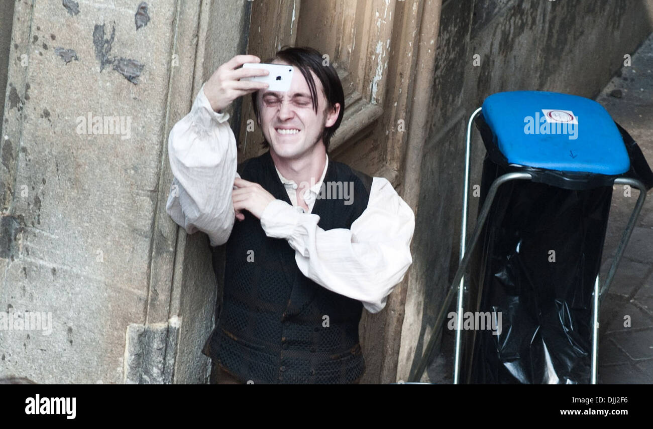 Tom Felton taking a photo with his iPhone Actors on set of 'Therese ...