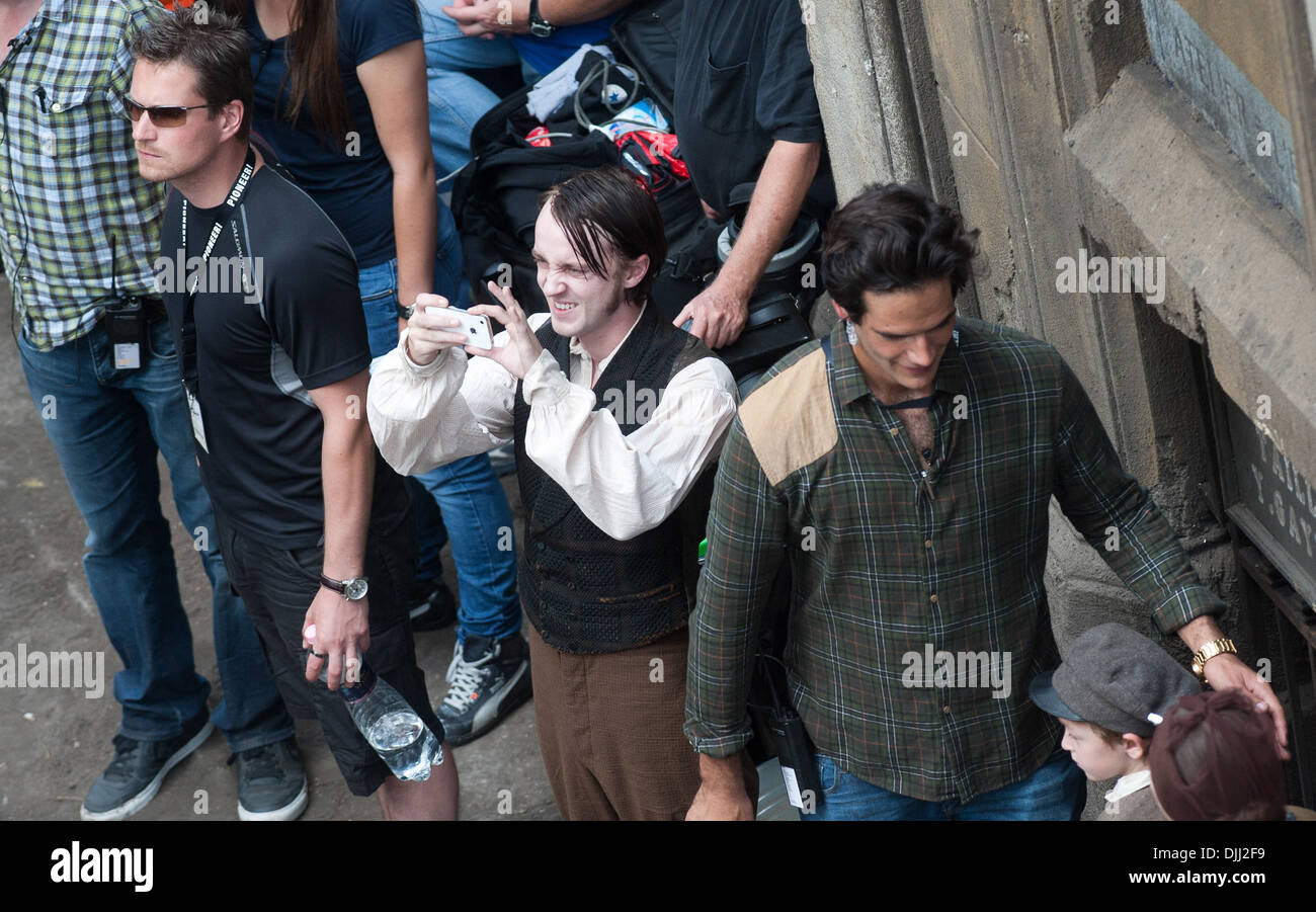 Tom Felton taking a photo with his iPhone Actors on set of 'Therese ...