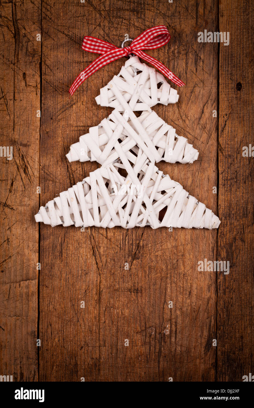 White wood rod Christmas tree shape decoration with checked bow on top ...