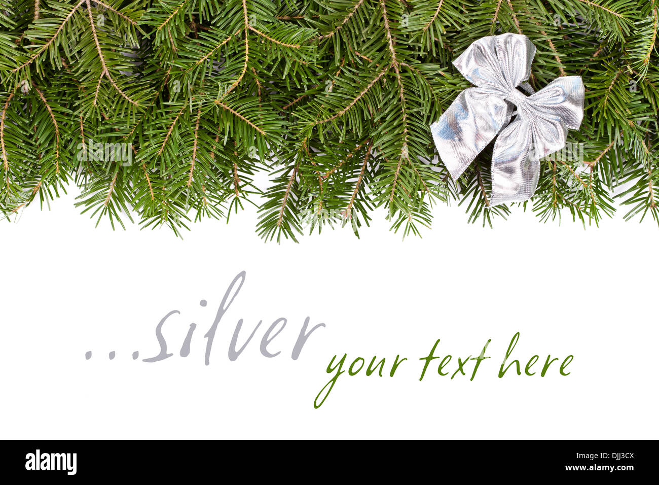 Frame Christmas twig with a silver bow isolated on white background ...