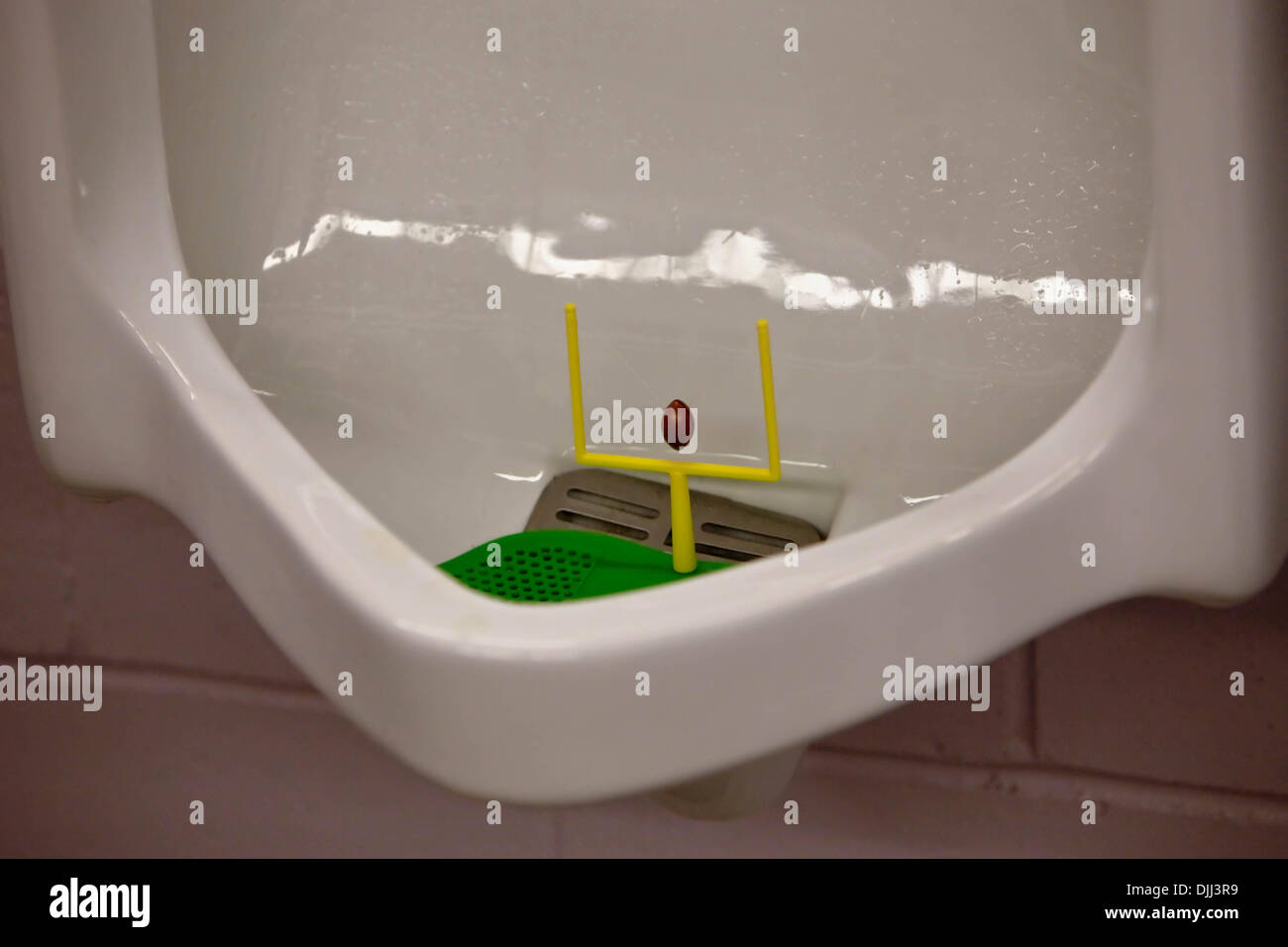 A creative target in the mens washroom during a CFL football game ...