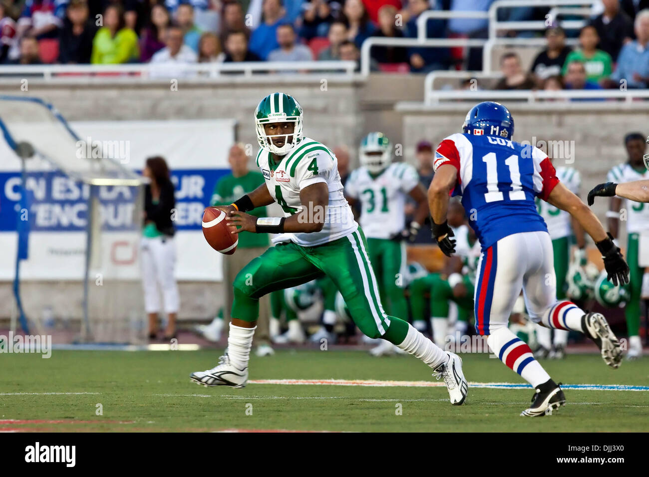 Saskatchewan QB, Darian Durant(4), tries to out-run Montreal LB, Chip ...