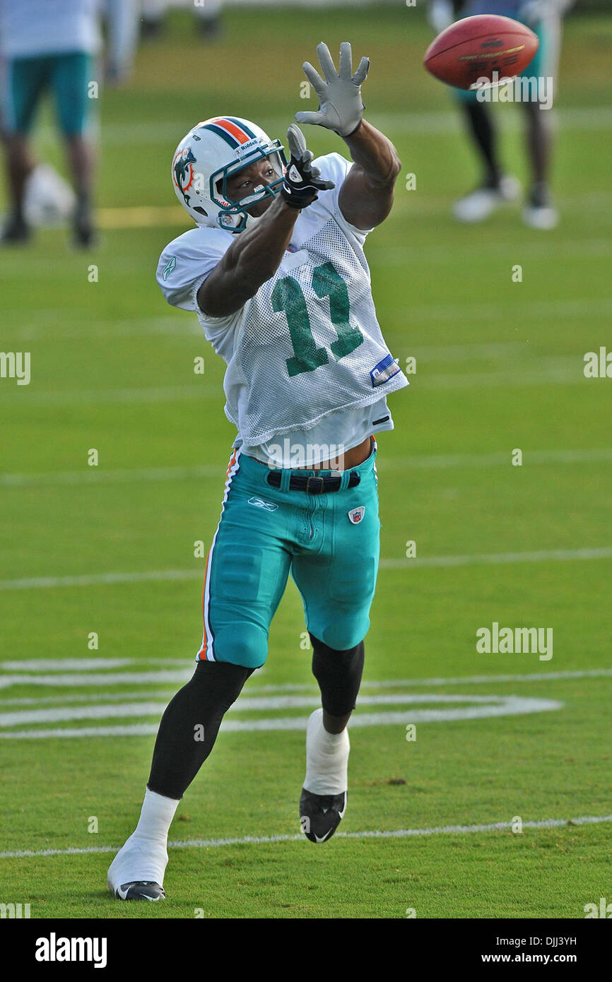 Miami Dolphins WR Julius Pruitt (11) reaches for a pass during practice ...