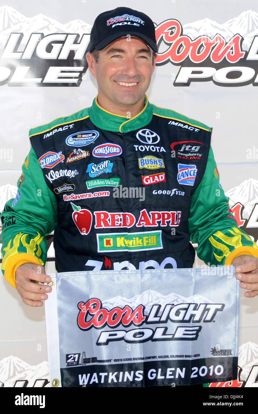 August 7, 2010: MARCOS AMBROSE poses with the Coors Light Pole award ...
