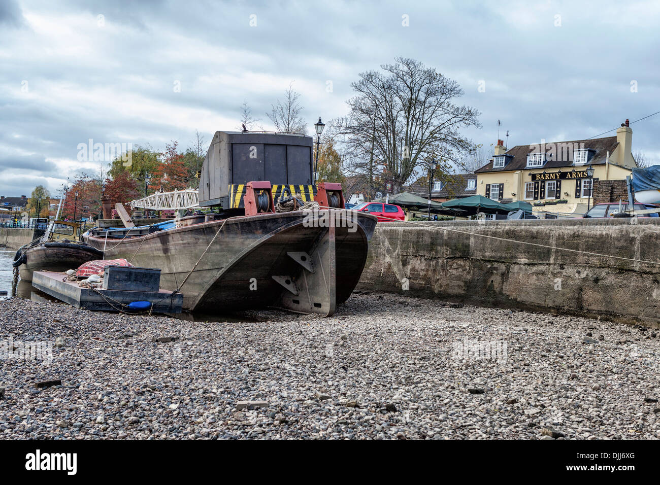 Boats are left high and dry during the annual draw-off of the river ...