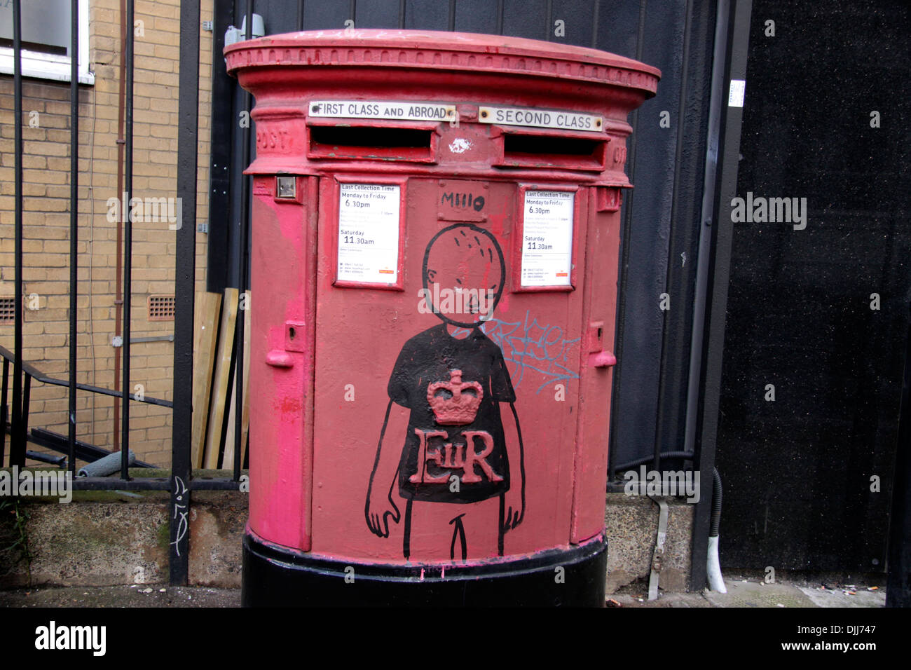 Graffiti by Miiio on a post box in Shoreditch, East London Stock Photo ...