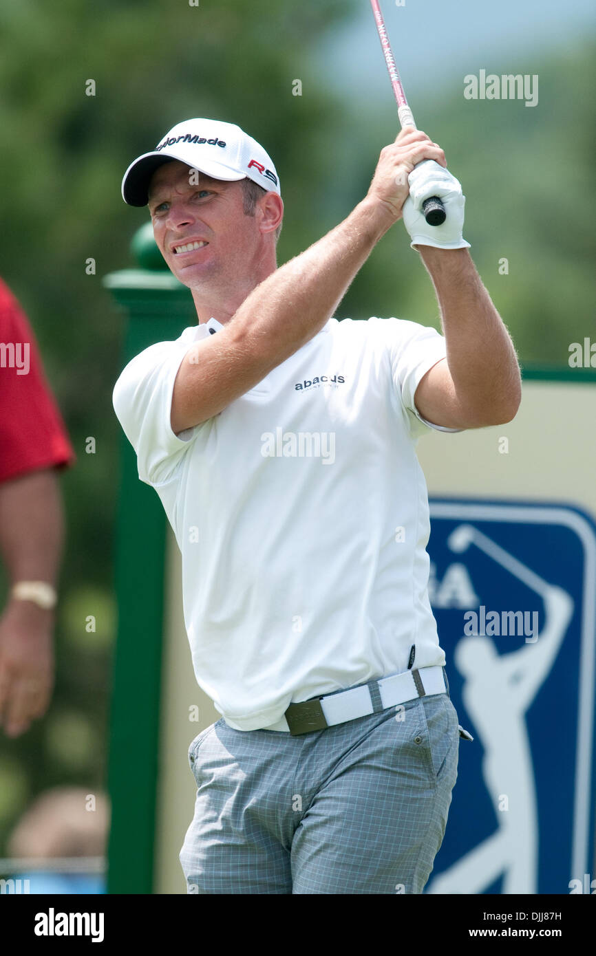 August 8, 2010: Professional golfer RICHARD S. JOHNSON watches his tee ...