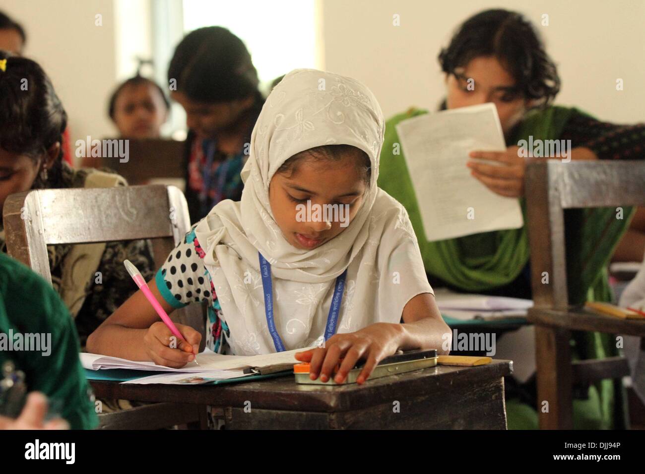 Dhaka 20 November 2013. Bangladeshi students sit for primary terminal ...