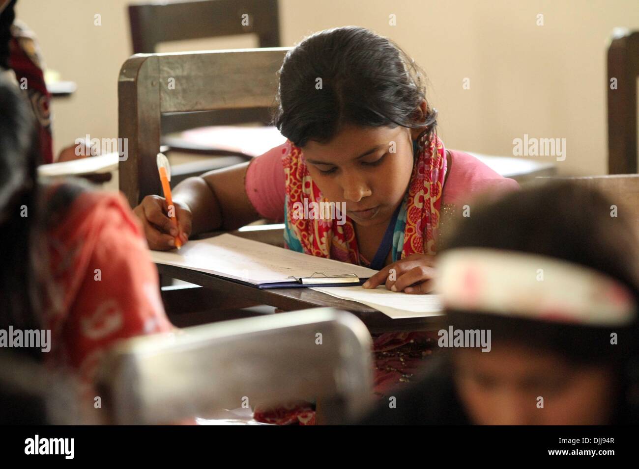 Dhaka 20 November 2013. Bangladeshi students sit for primary terminal ...