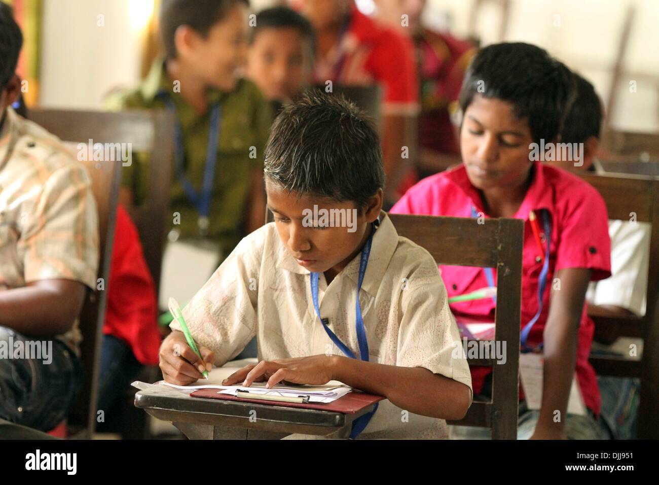 Dhaka 20 November 2013. Bangladeshi students sit for primary terminal ...
