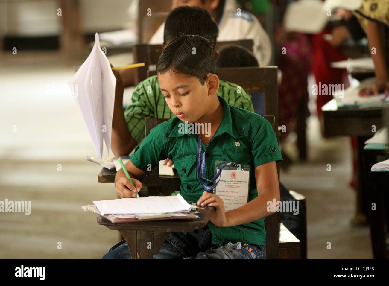 Dhaka 20 November 2013. Bangladeshi students sit for primary terminal ...