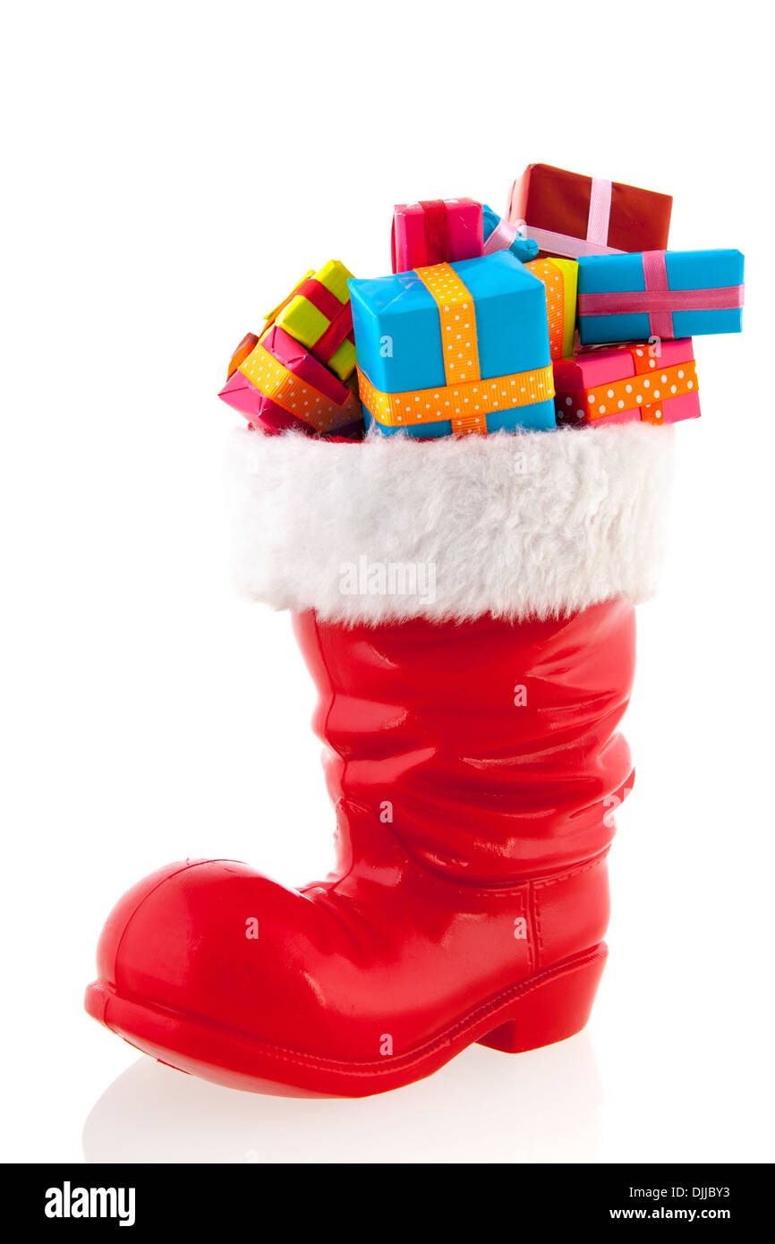 Christmas boot full with presents isolated over white background Stock ...