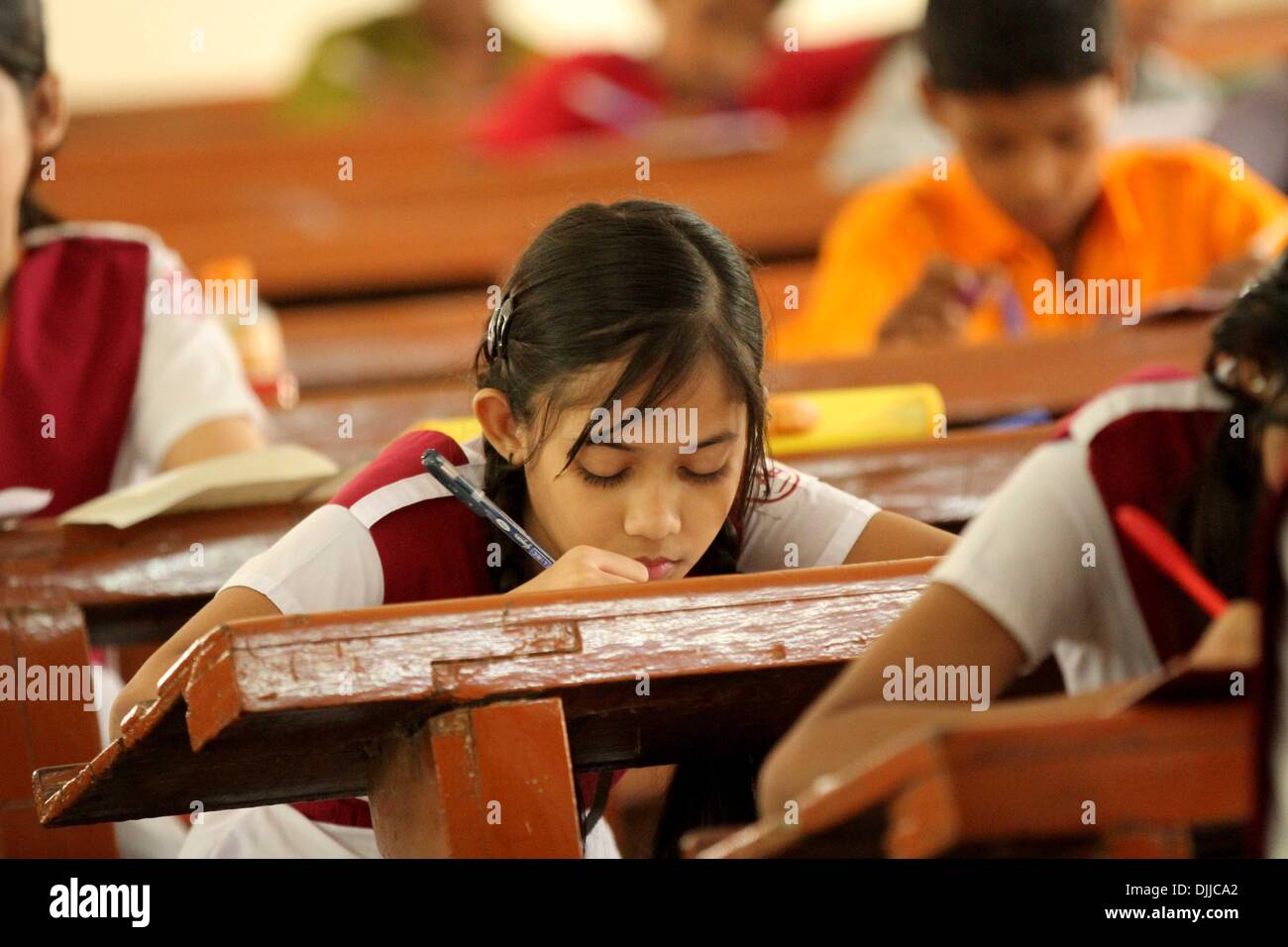 Dhaka 20 November 2013. Bangladeshi students sit for primary terminal ...