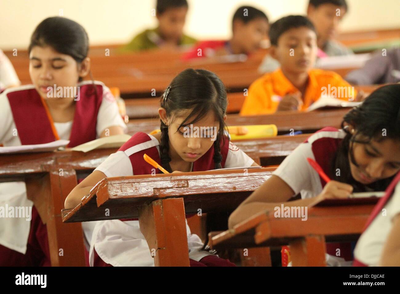 Dhaka 20 November 2013. Bangladeshi students sit for primary terminal ...