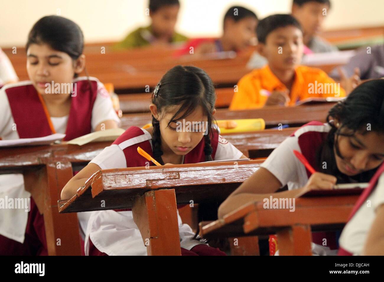 Dhaka 20 November 2013. Bangladeshi students sit for primary terminal ...