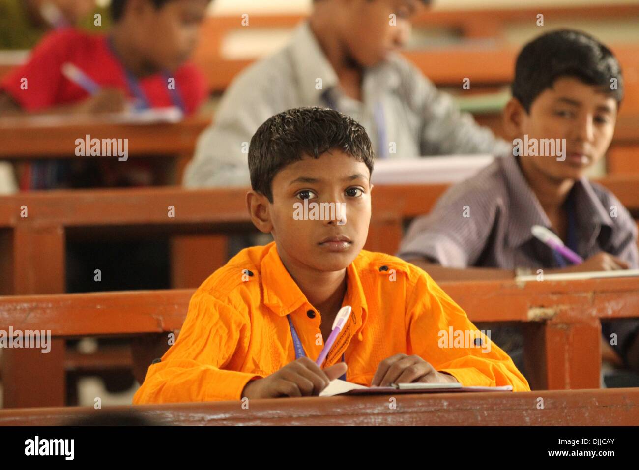 Dhaka 20 November 2013. Bangladeshi students sit for primary terminal ...