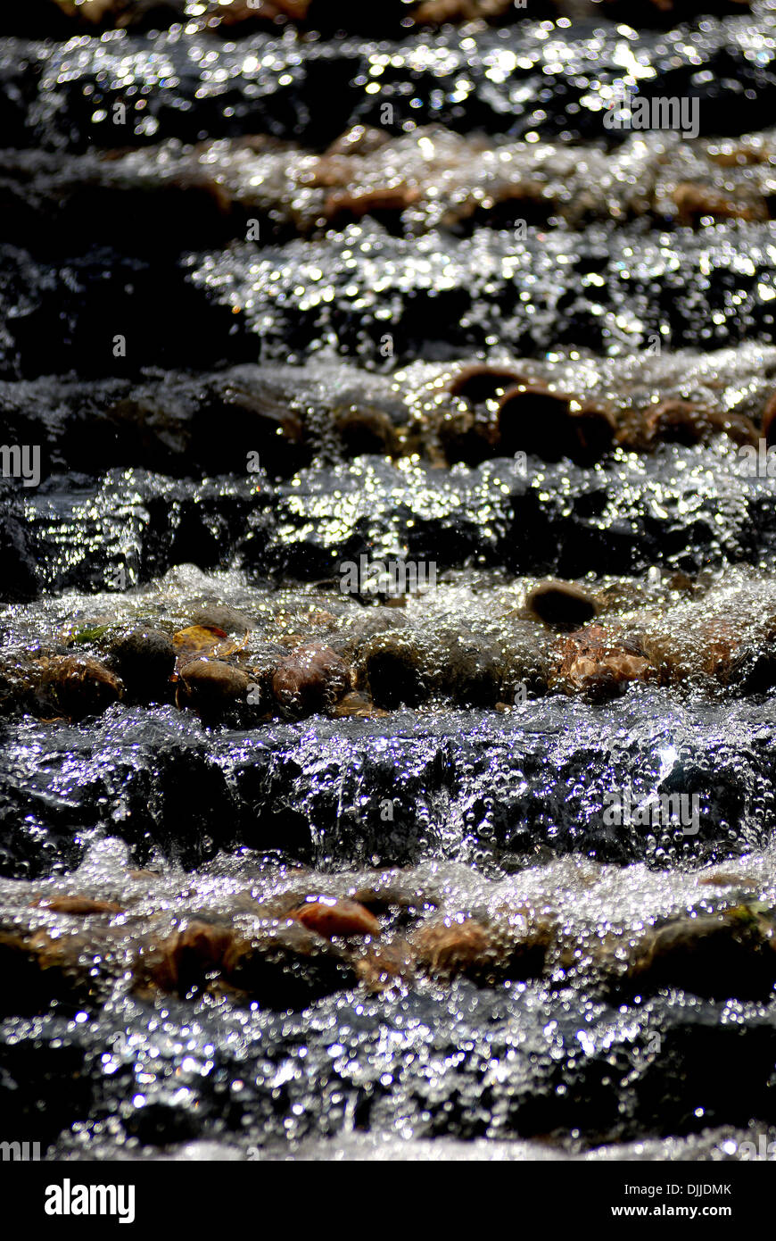 Water cascading down steps Stock Photo - Alamy