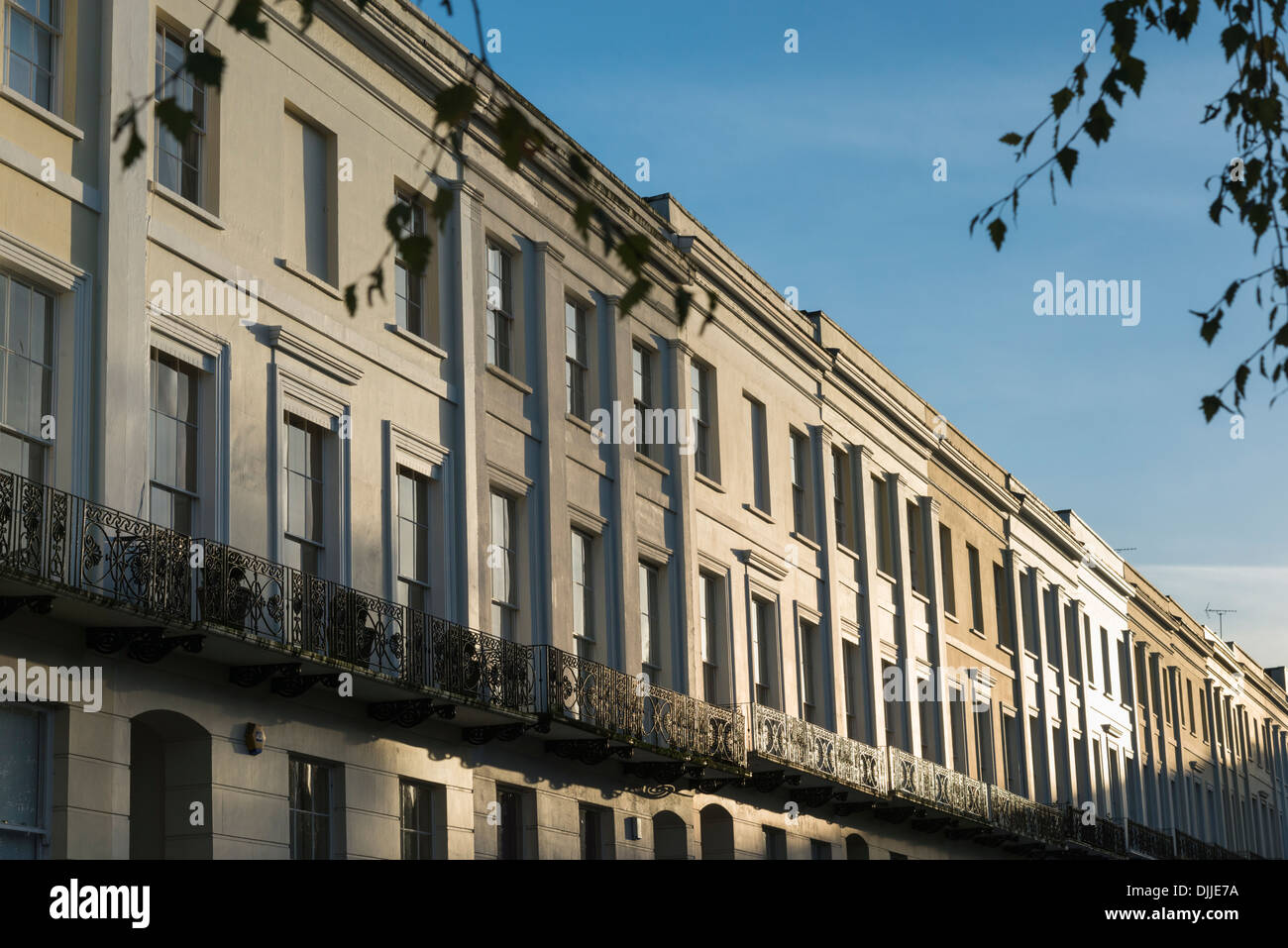 Regency buildings and town houses in Cheltenham UK in evening sunshine ...
