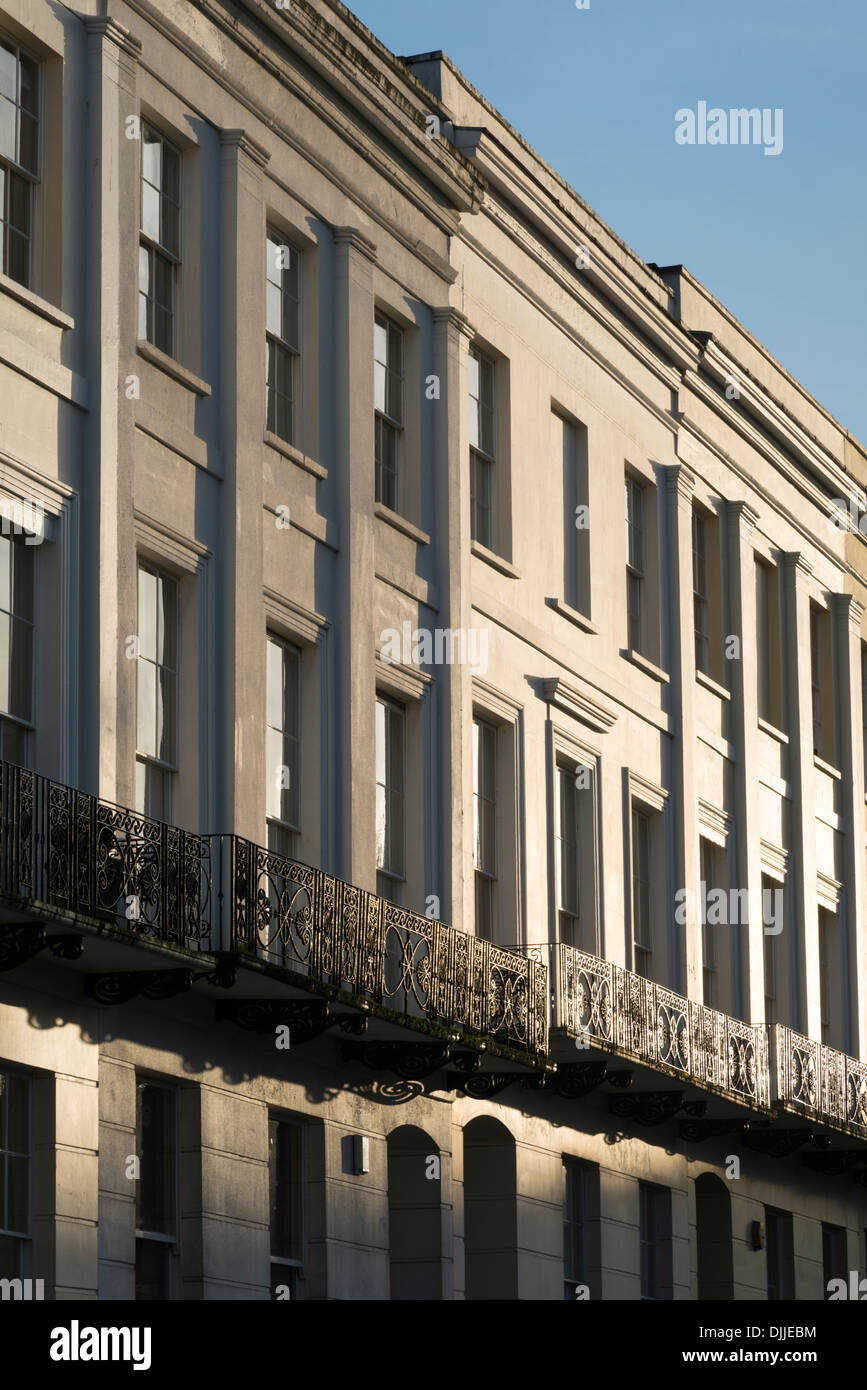Regency buildings and town houses in Cheltenham UK in evening sunshi ...