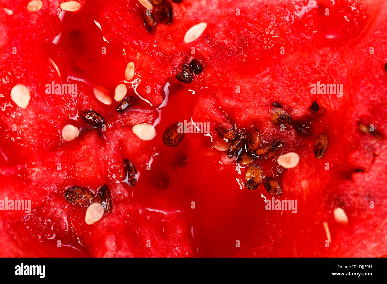 Macro photo of watermelon seeds inside the fruit Stock Photo - Alamy