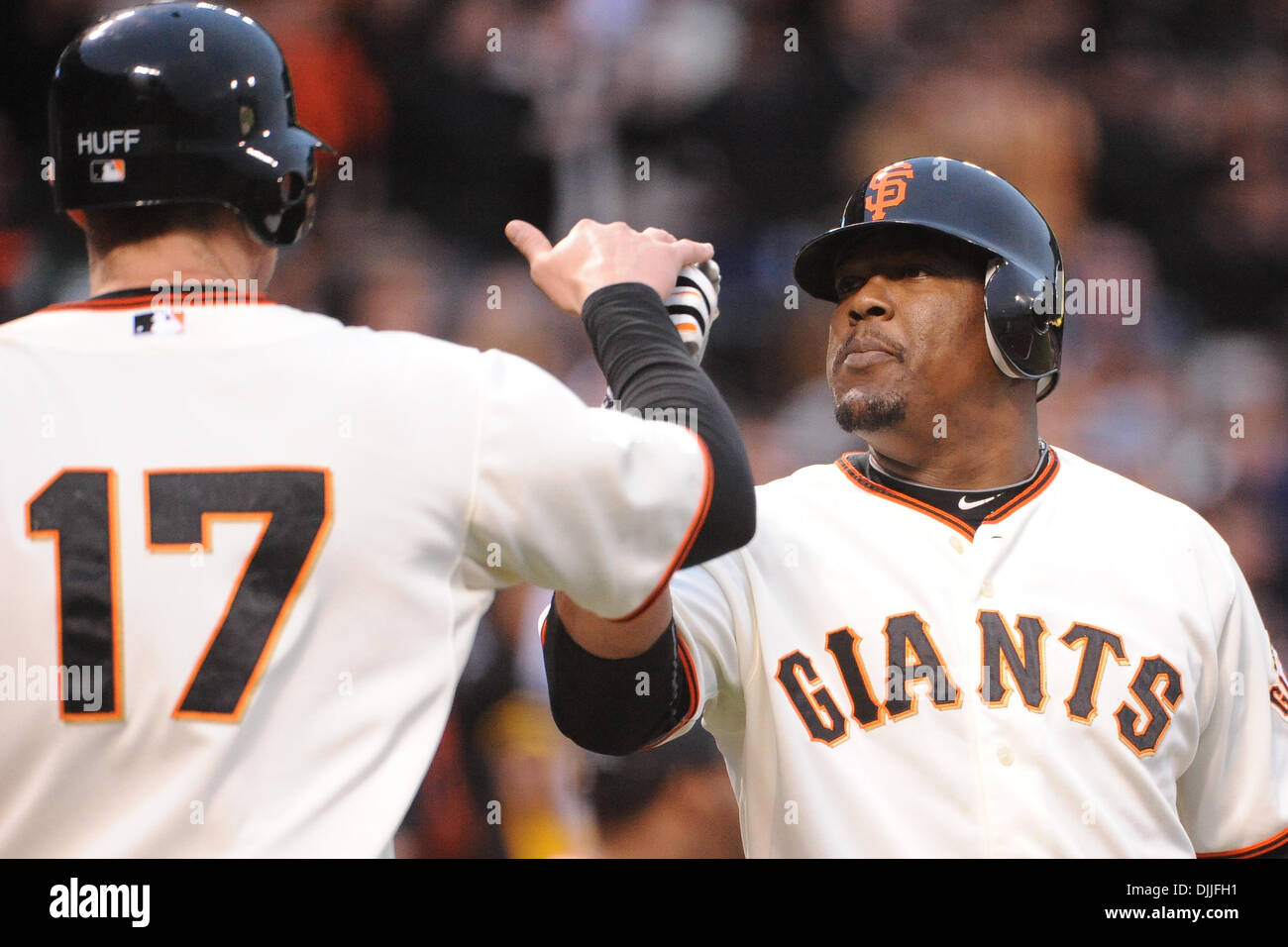 11 August, 2010: San Francisco Giants JUAN URIBE (#5) congratulates ...