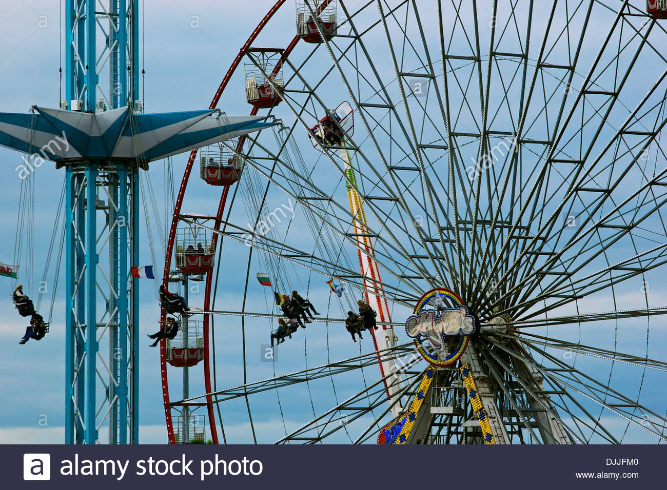 Fairground swing chair thrill ride and ferris wheel Goose Fair Stock ...