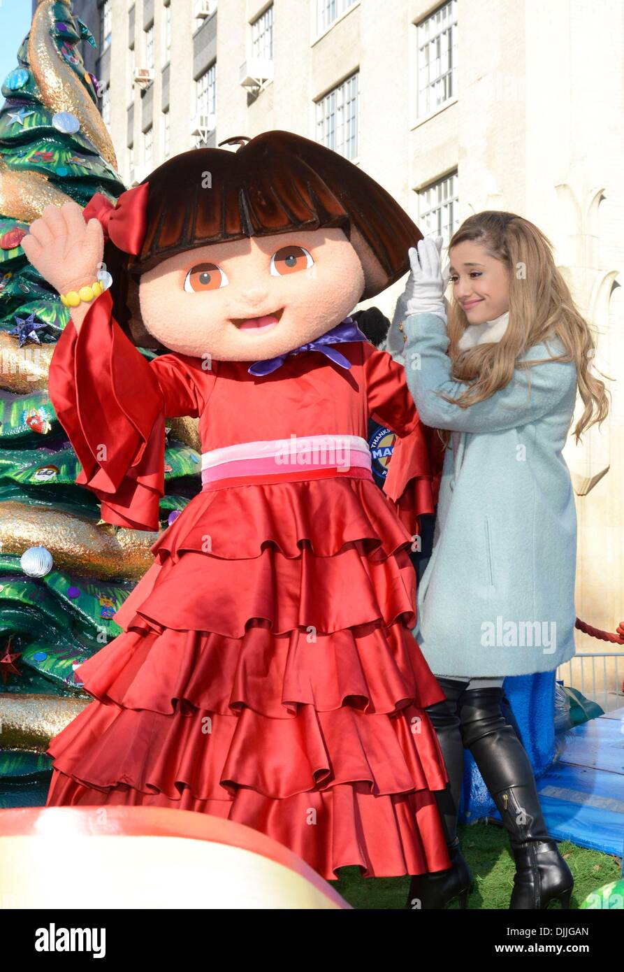 New York, NY, USA. 28th Nov, 2013. Ariana Grande gets hit in the head ...