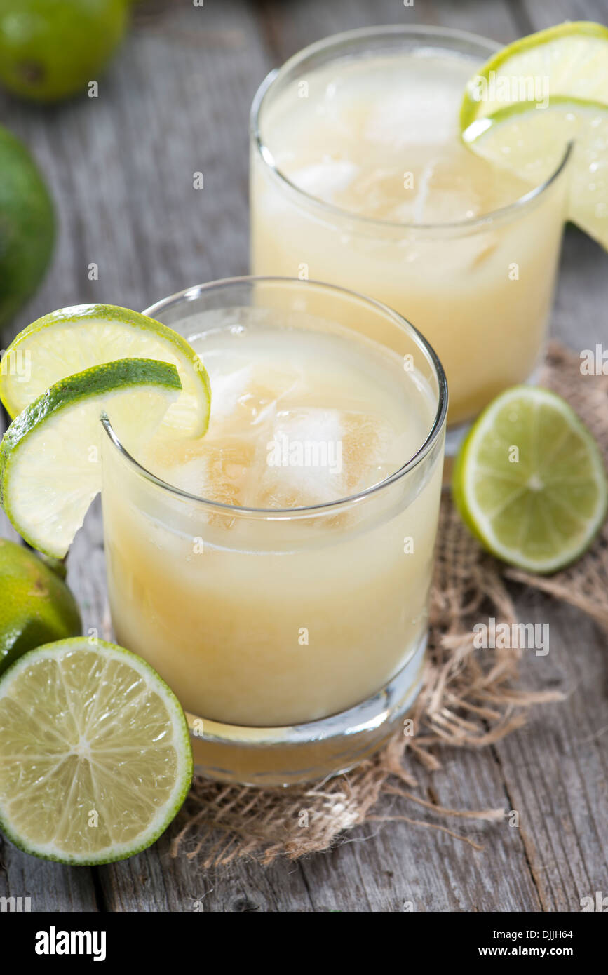 Glass filled with fresh made Lime Juice Stock Photo - Alamy