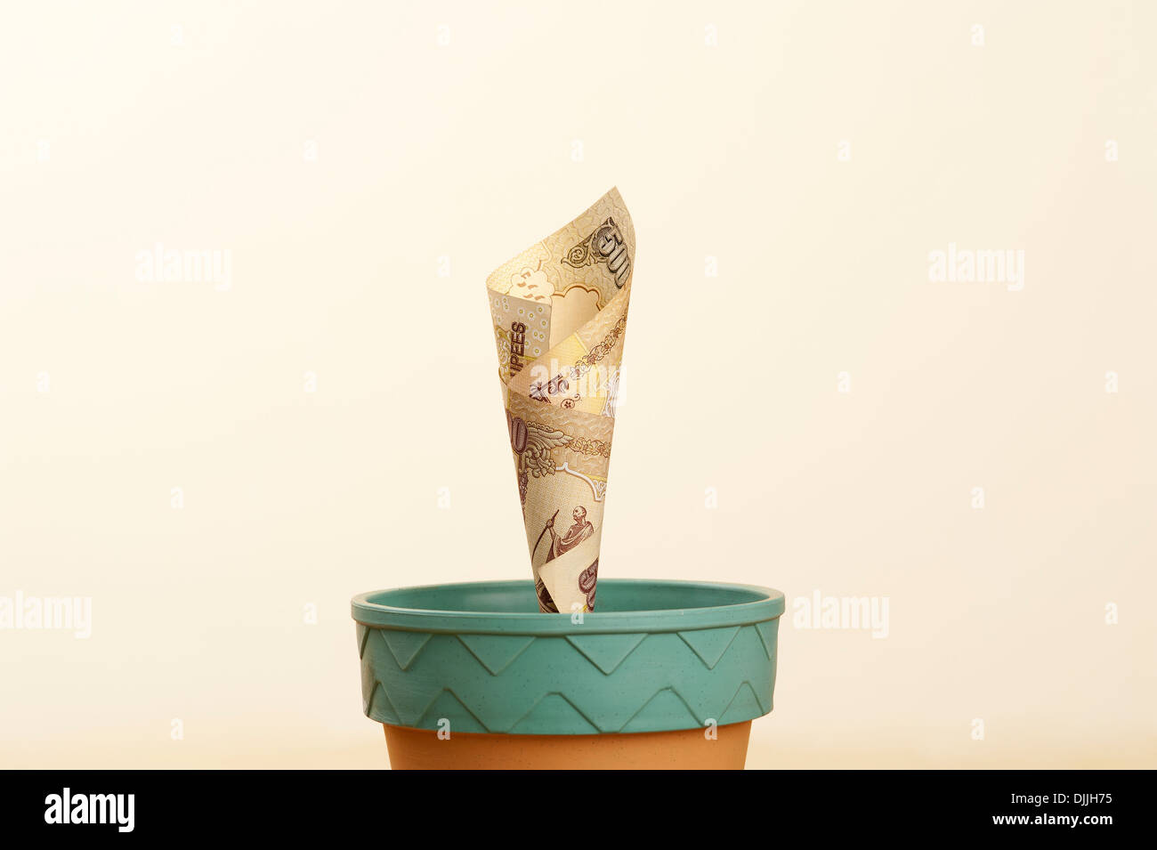 Money Plant - Conceptual image depicting money growing like a plant in ...