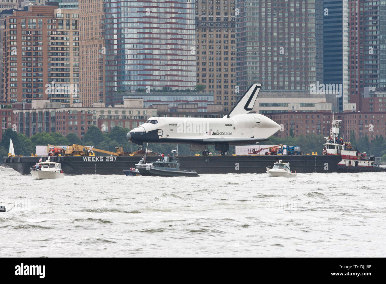 The NASA space shuttle prototype Enterprise sails past World Trade ...
