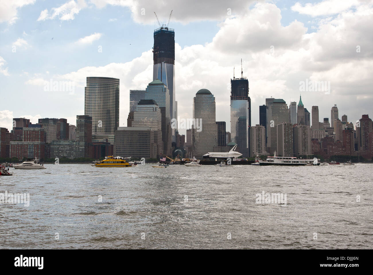 The NASA space shuttle prototype Enterprise sails past World Trade ...