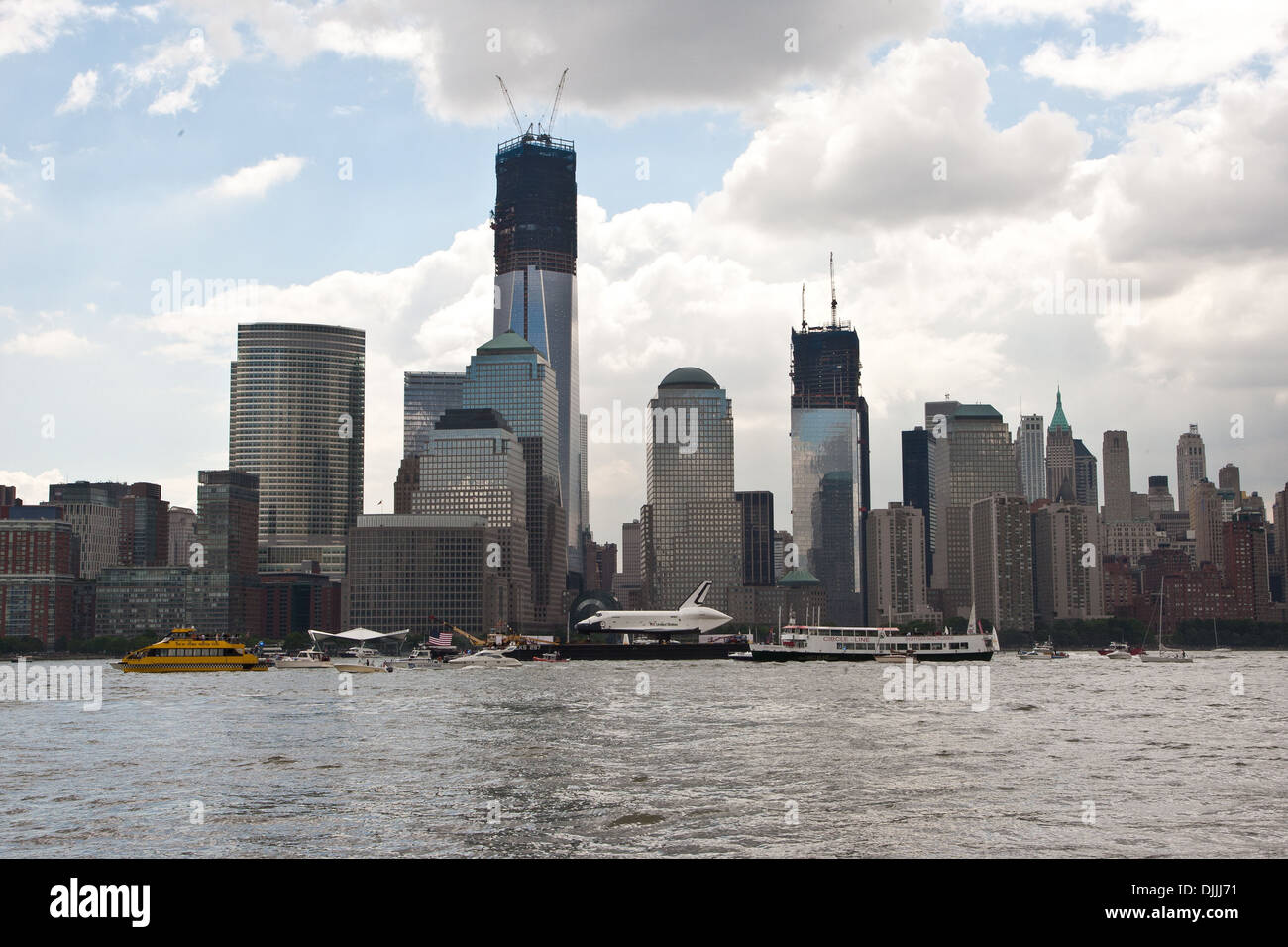 The NASA space shuttle prototype Enterprise sails past World Trade ...