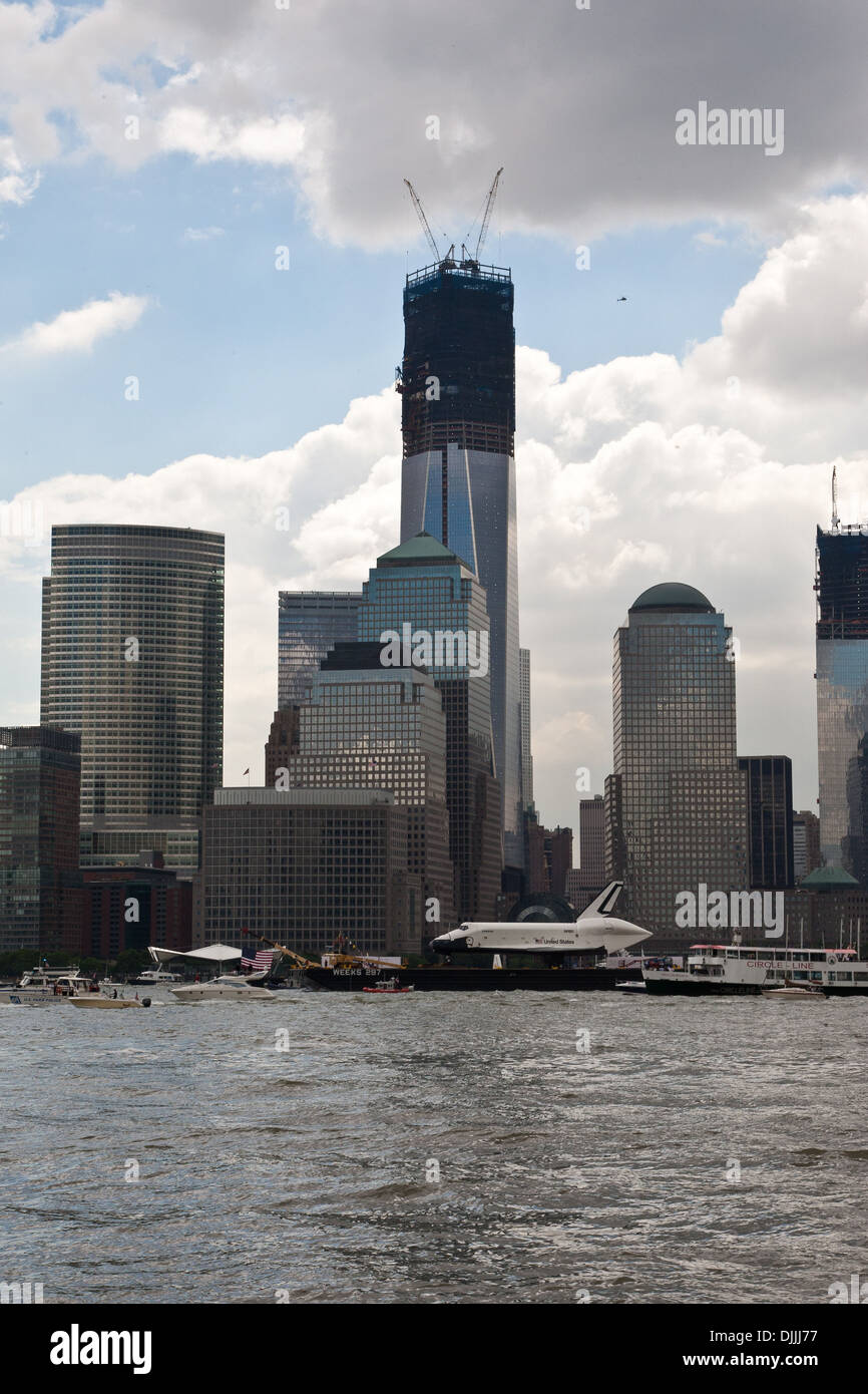 The NASA space shuttle prototype Enterprise sails past World Trade ...