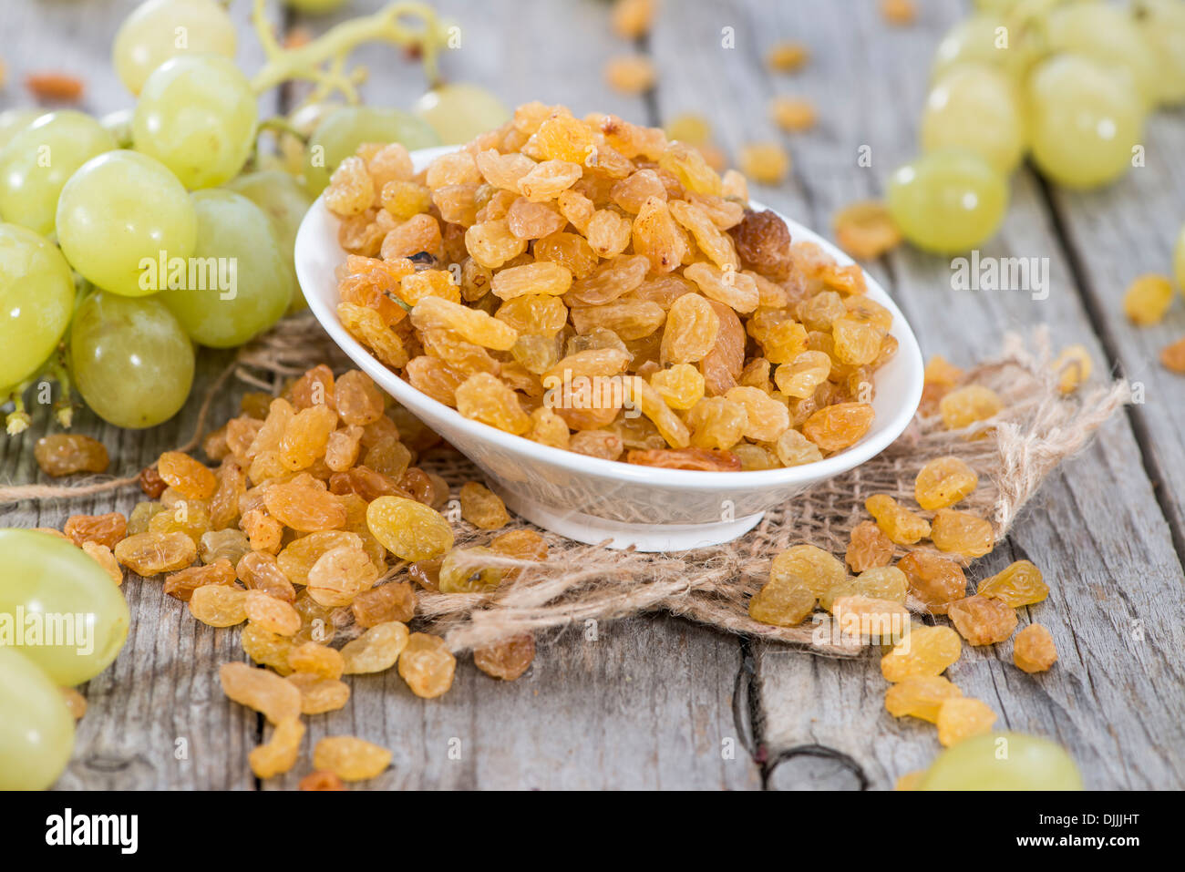 Portion of dried Grapes with some fresh fruits Stock Photo - Alamy