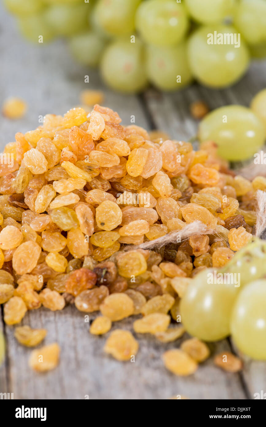 Portion of dried Grapes with some fresh fruits Stock Photo - Alamy