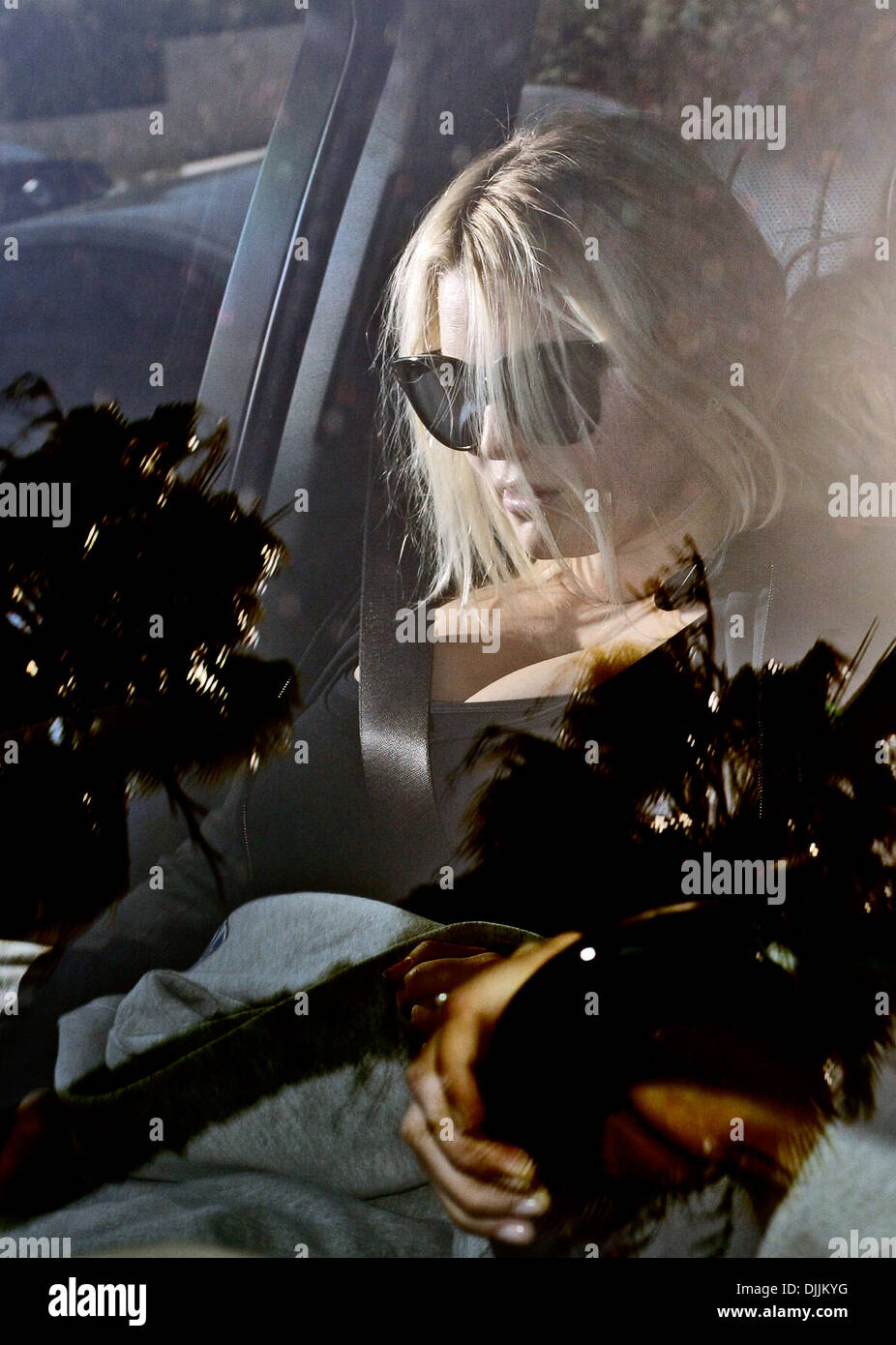 New mum Jessica Simpson is photographed in her car as she leaves her ...