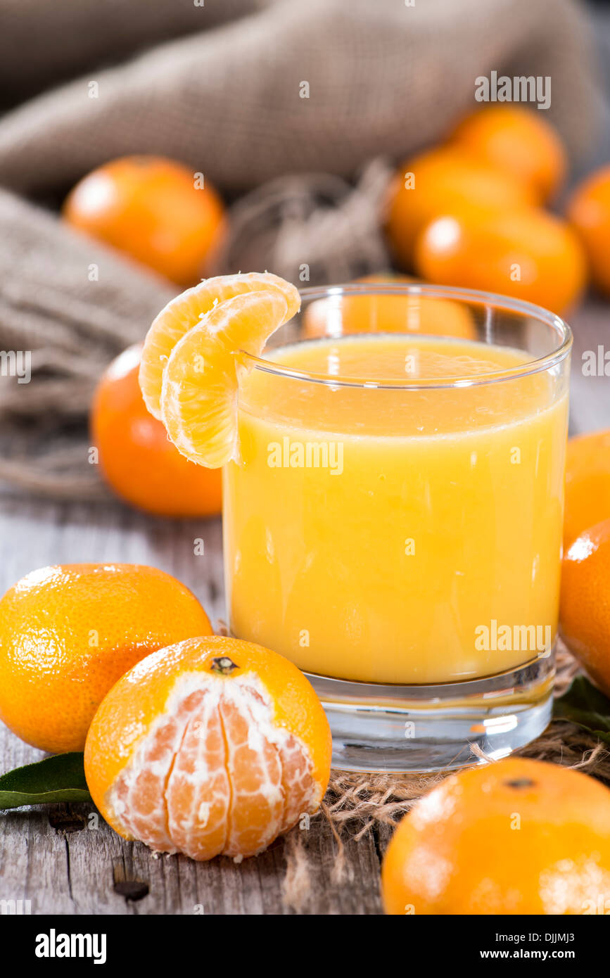 Fresh made Tangerine Juice in a glass Stock Photo - Alamy