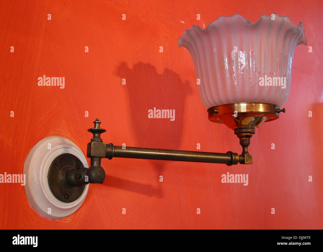 Vintage light on red background Stock Photo - Alamy