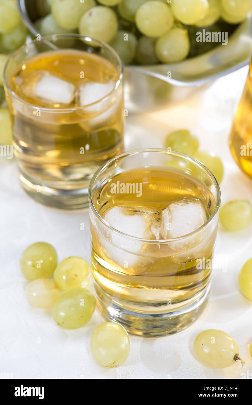 Grape Juice in a glass with fresh fruits Stock Photo - Alamy