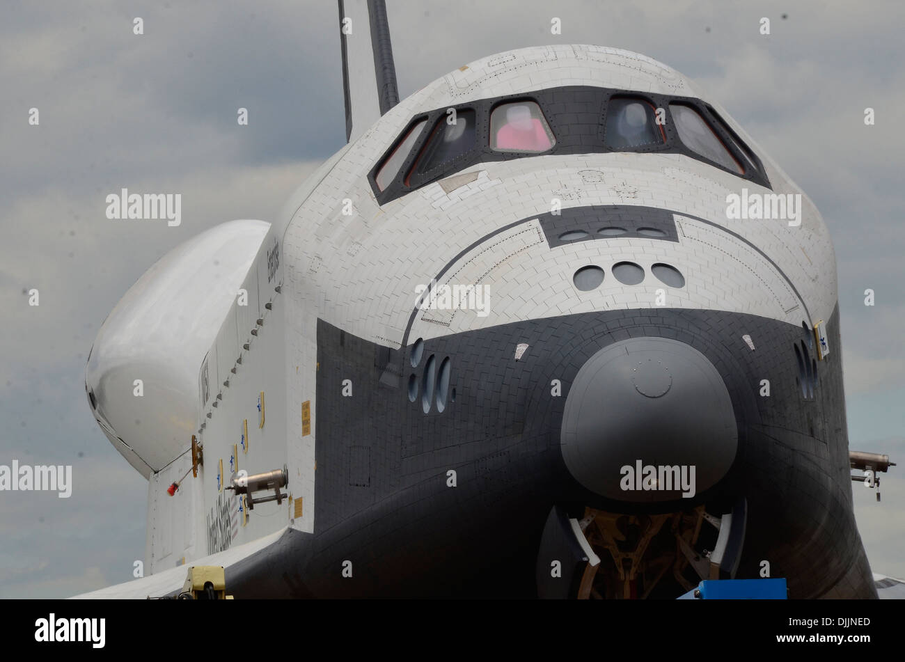 The NASA space shuttle prototype Enterprise waits to be hoisted by crane into its final resting ...